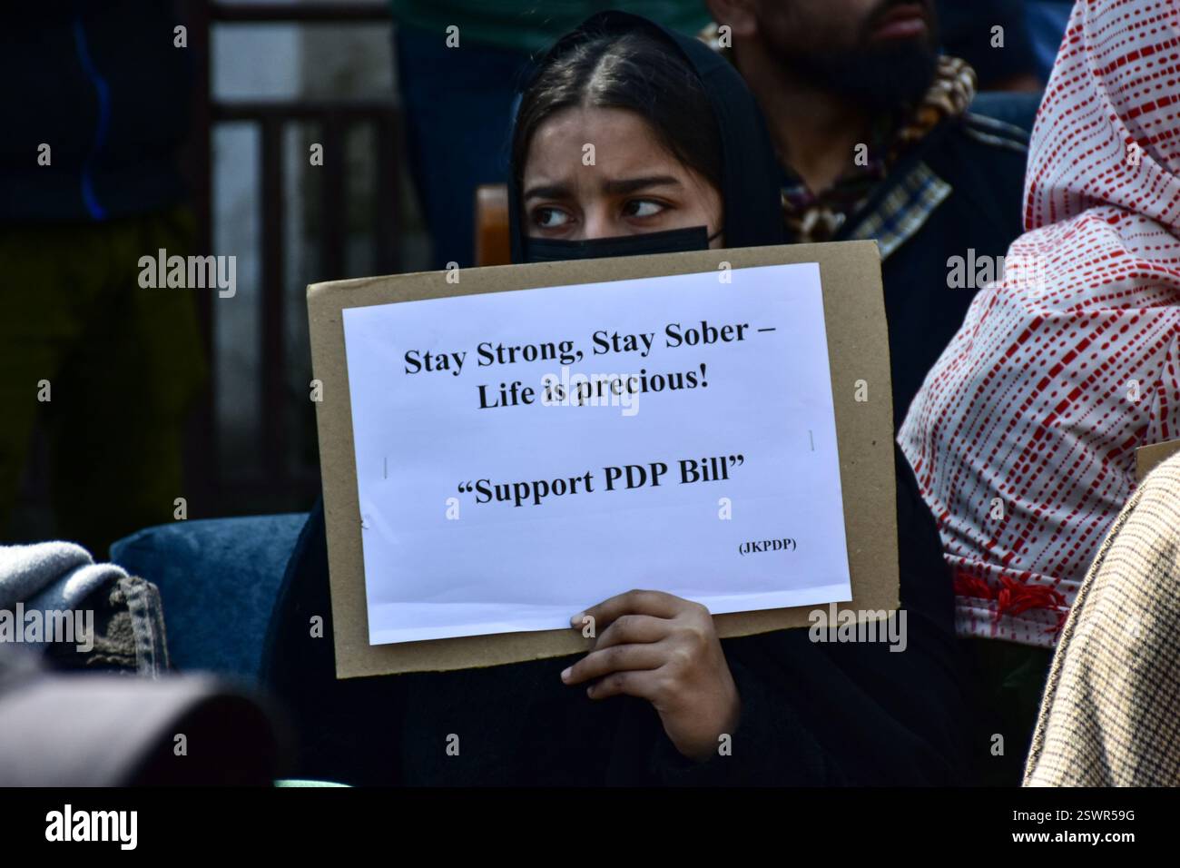 Srinagar, India. 22nd Feb, 2025. A supporter of The Jammu and Kashmir ...