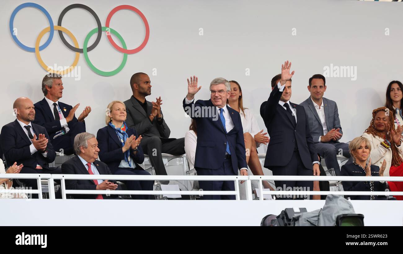 July 26th, 2024 - Paris, France: Thomas Bach and Emmanuel Macron wave ...