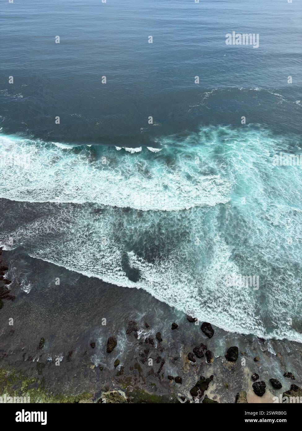 Powerful Ocean Waves Rolling in at Uluwatu, Bali Stock Photo - Alamy