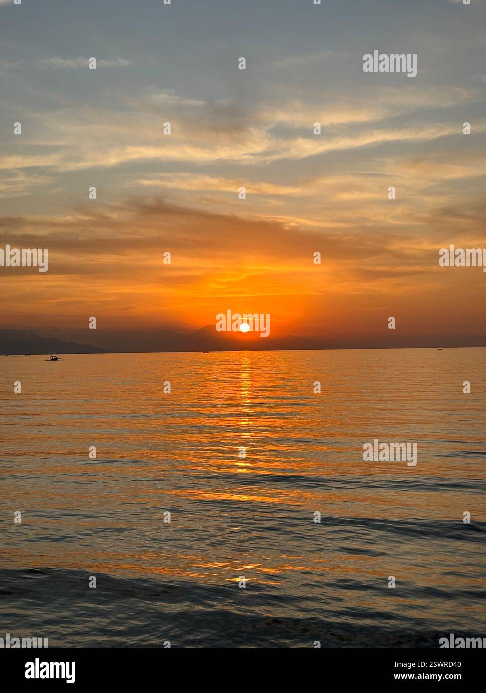 Golden Sunset Over the Ocean in Bali – A Breathtaking View Stock Photo ...