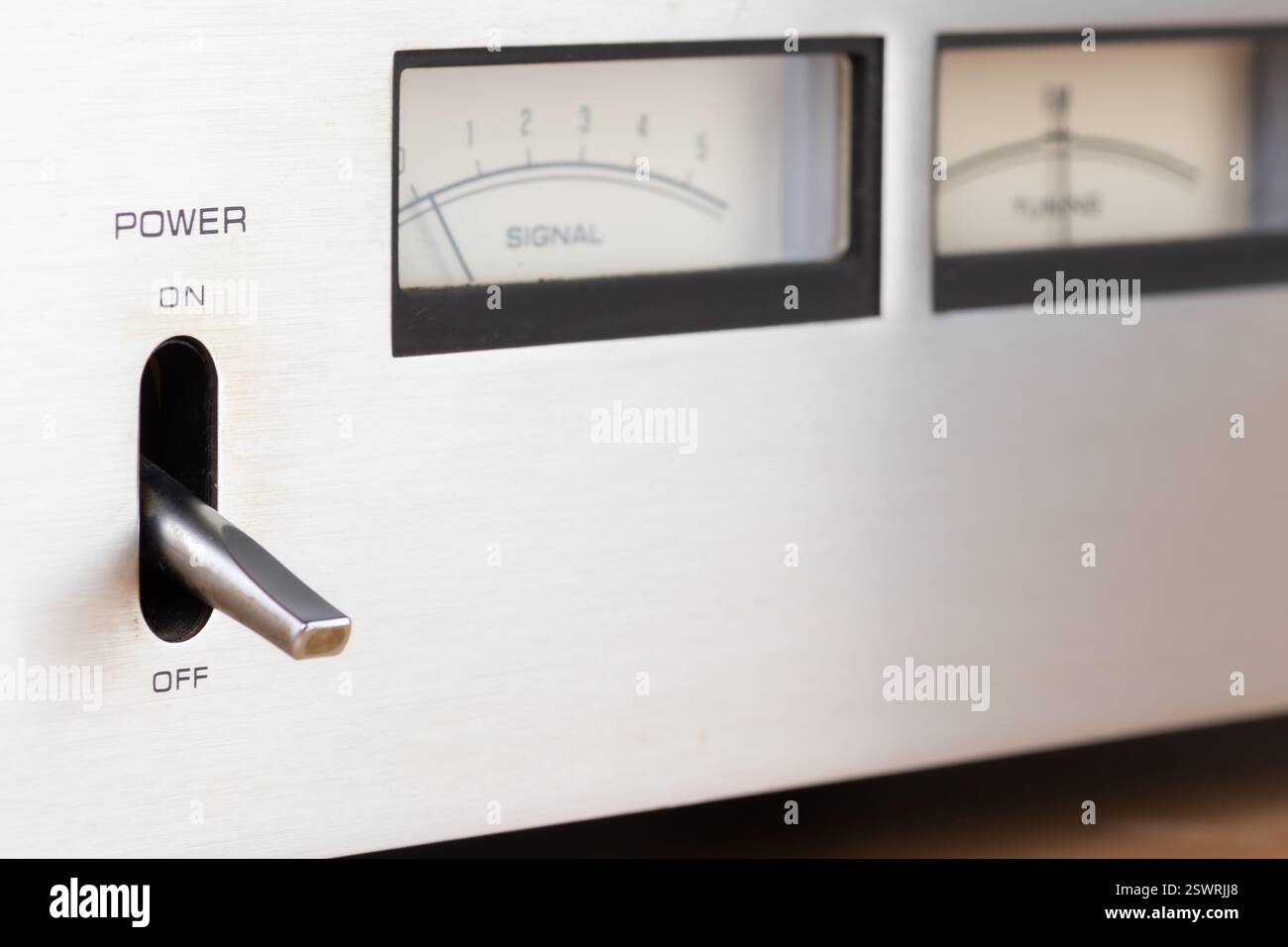 Detailed close-up view of a stereo system's power, focusing on its ...