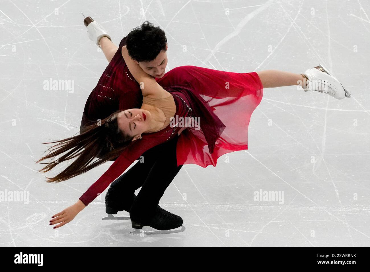 Ren Junfei and Xing Jianing of China performs during the ice dance free ...