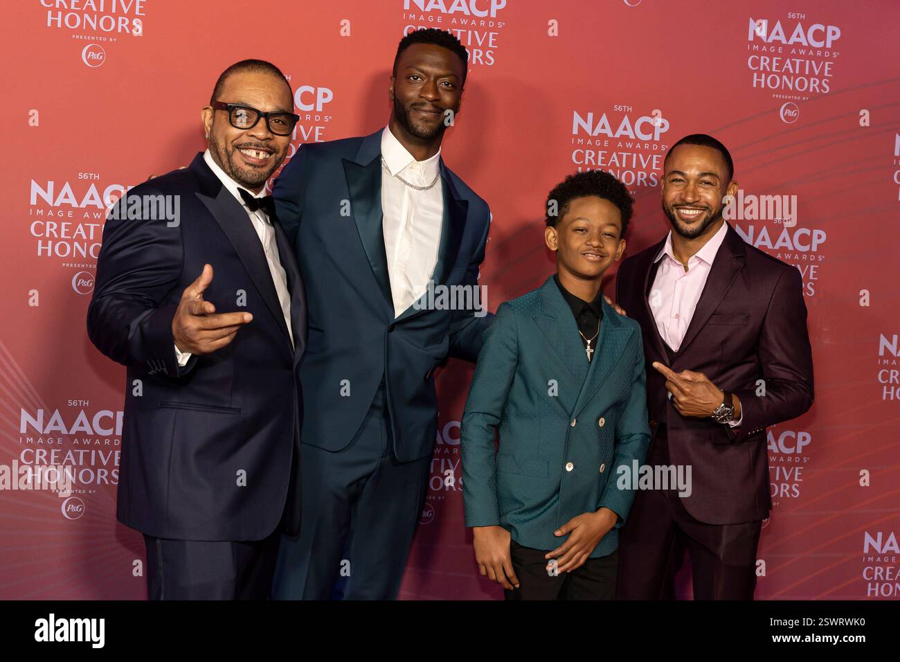 Clarence Maclin, Aldis Hodge, Percy Daggs IV and Percy Daggs III attend ...