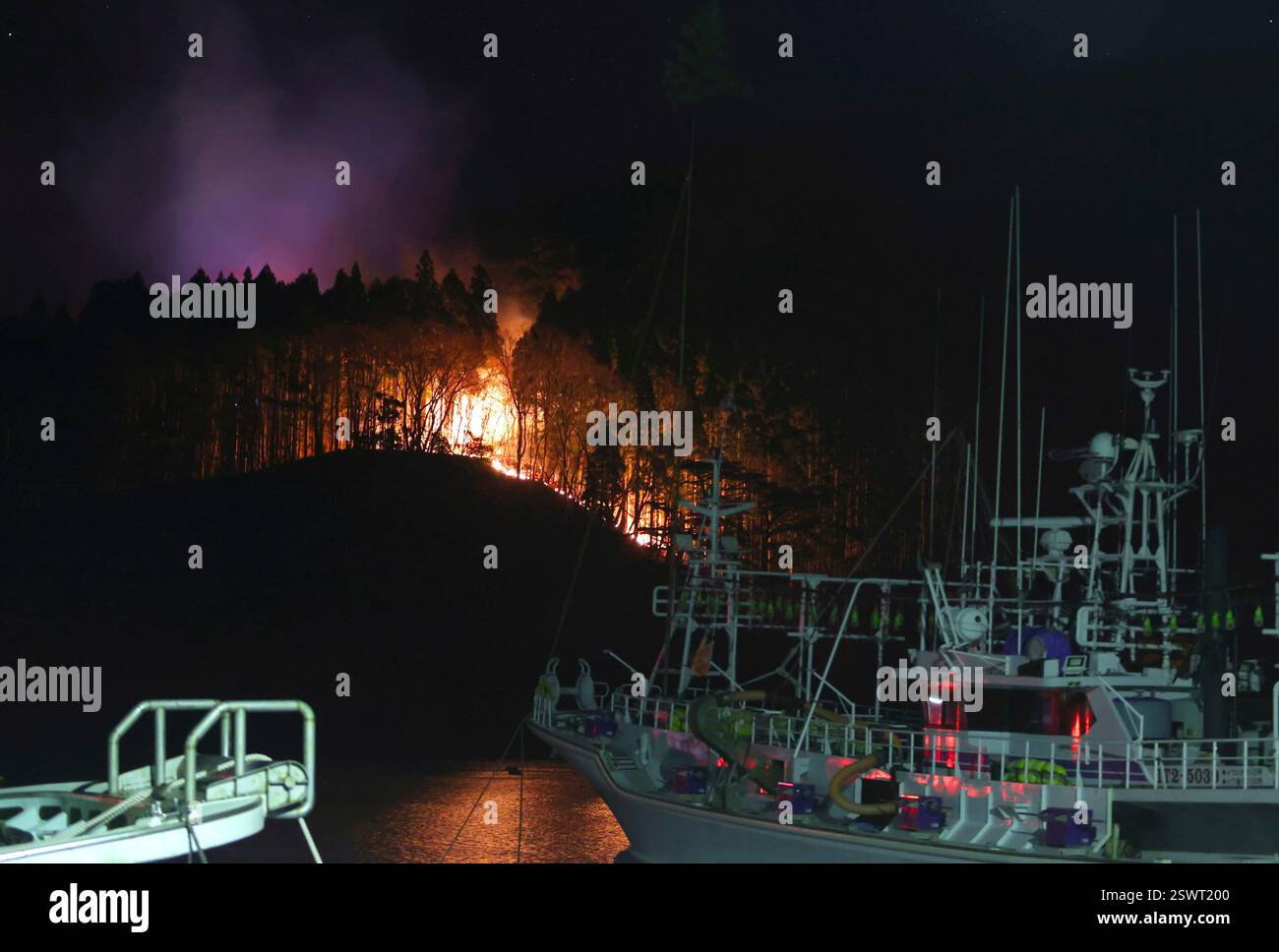 A photo shows a forest fire, continues to spread in Ofunato City, Iwate ...