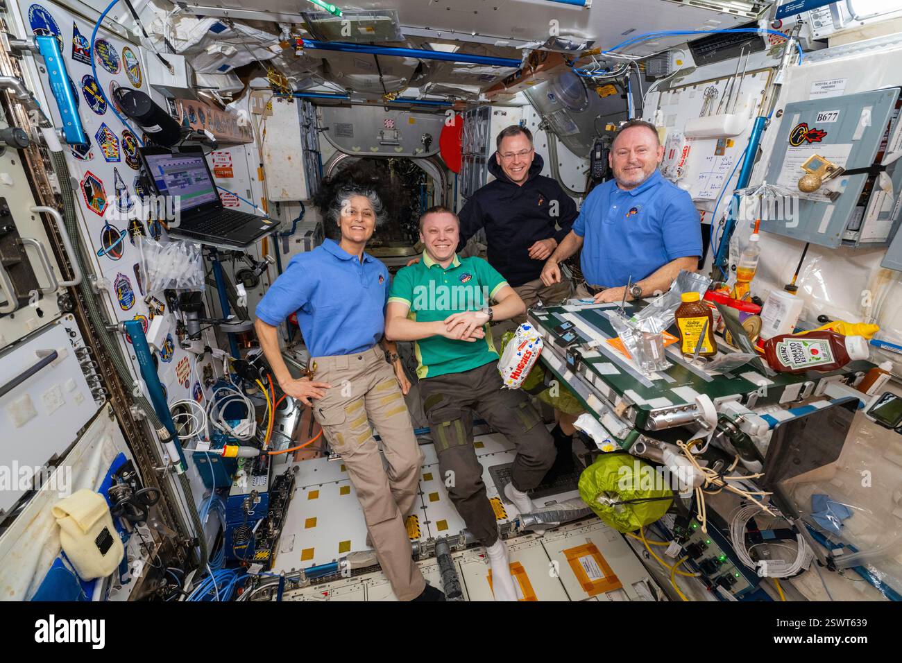 ISS - 19 February 2025 - NASA's SpaceX Crew-9 members pose together for a portrait inside the ...