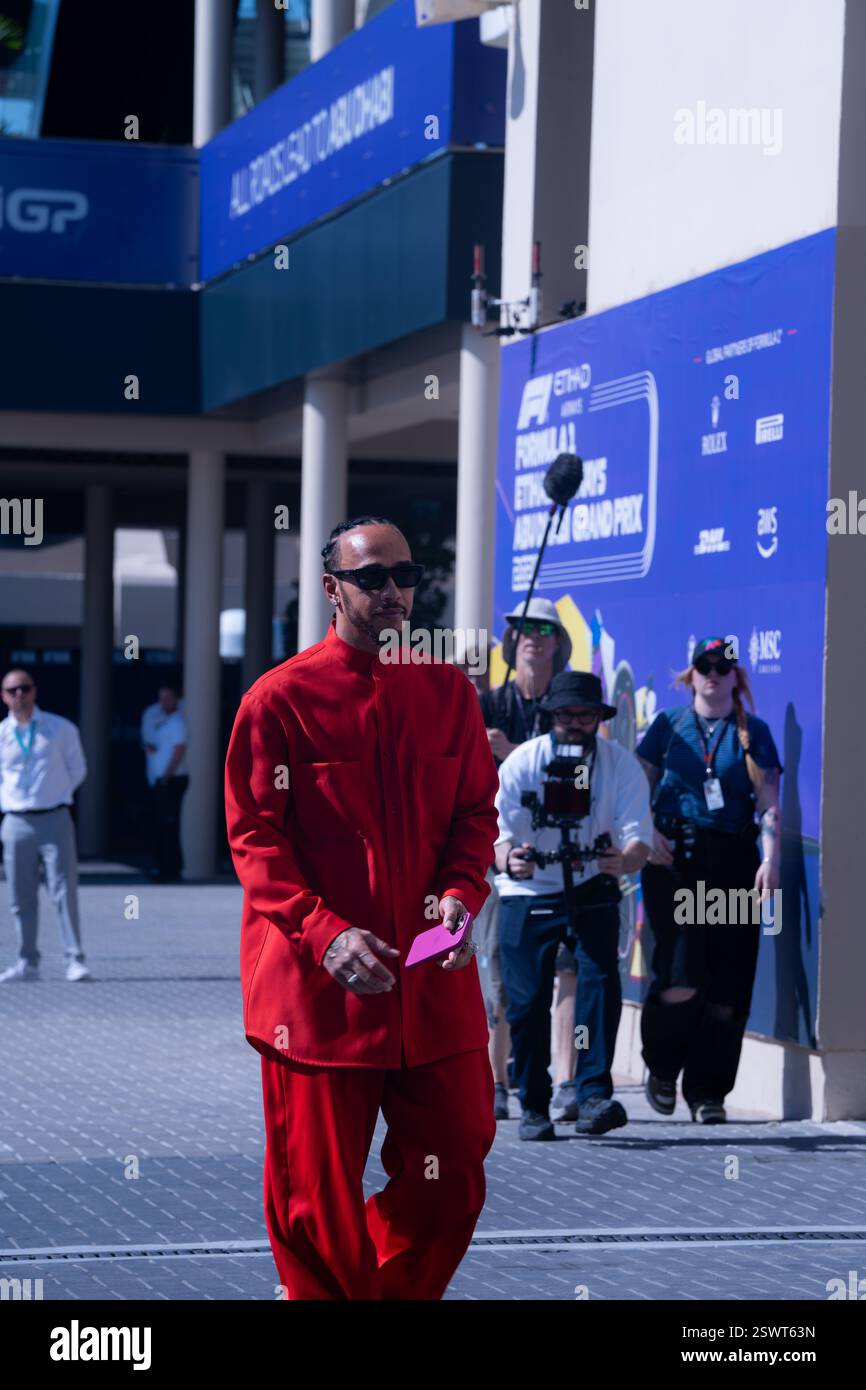 Lewis Hamilton of Great Britain and Mercedes, arriving in the paddock ...