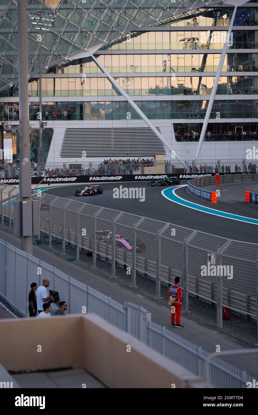 Haas, Aston Martin Mercedes and Alpine F1 cars driving during race day of the F1 Etihad Airways ...