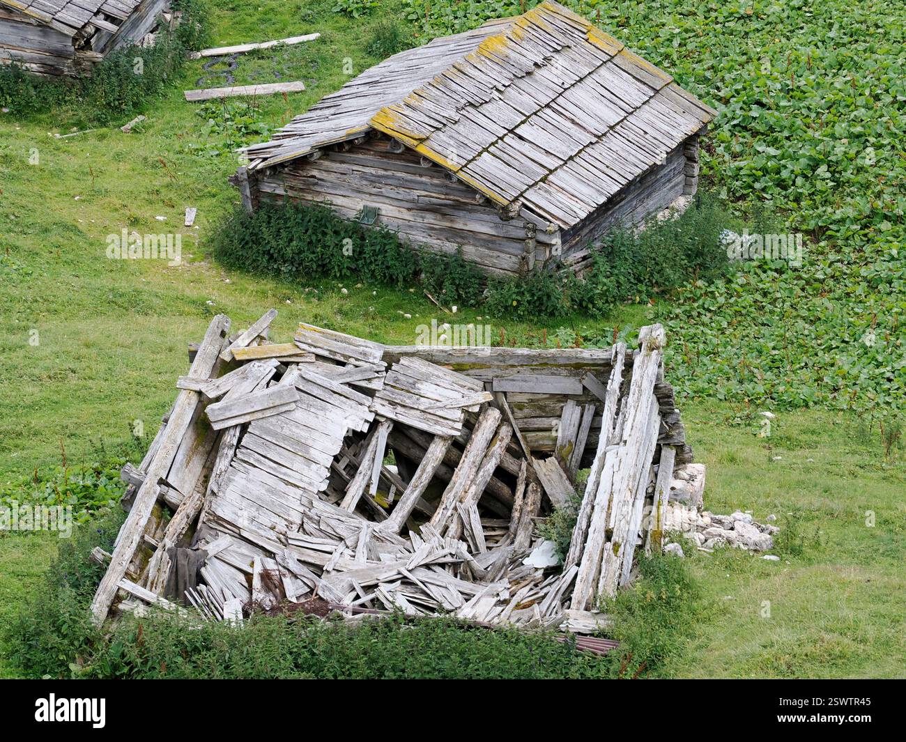 ruins of collapsed wooden hut in dolomites view Stock Photo - Alamy