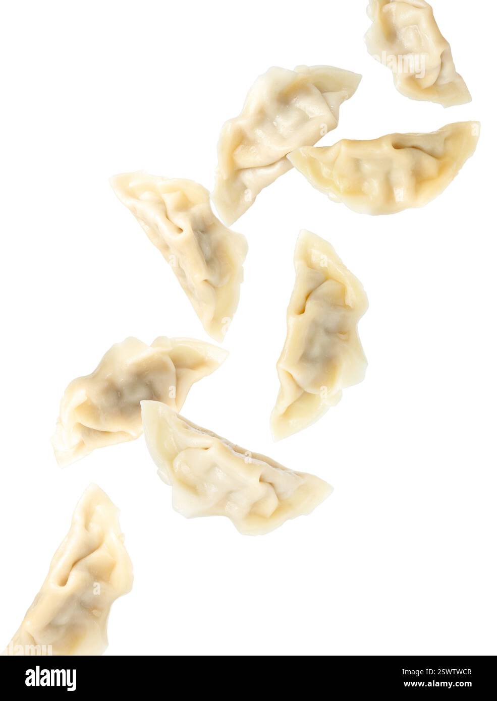 Tasty boiled gyoza (dumplings) in air on white background Stock Photo ...