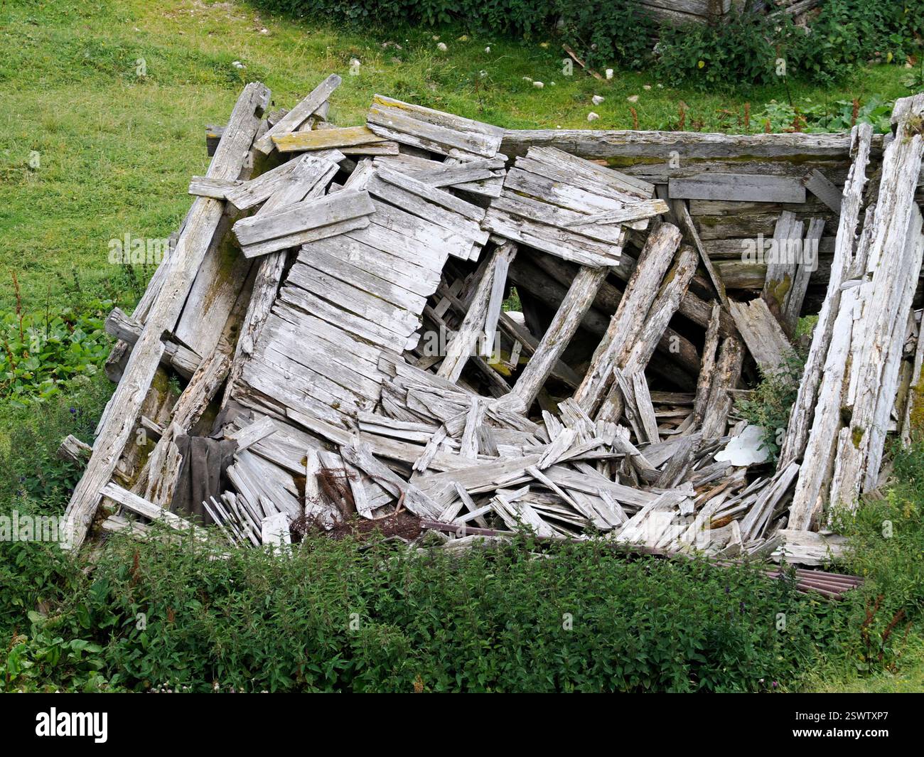 ruins of collapsed wooden hut in dolomites view Stock Photo - Alamy