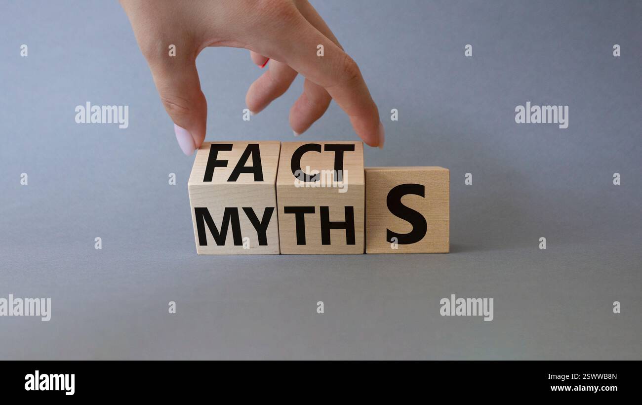 Facts vs Myths symbol. Businessman Hand turns cubes and changes word ...