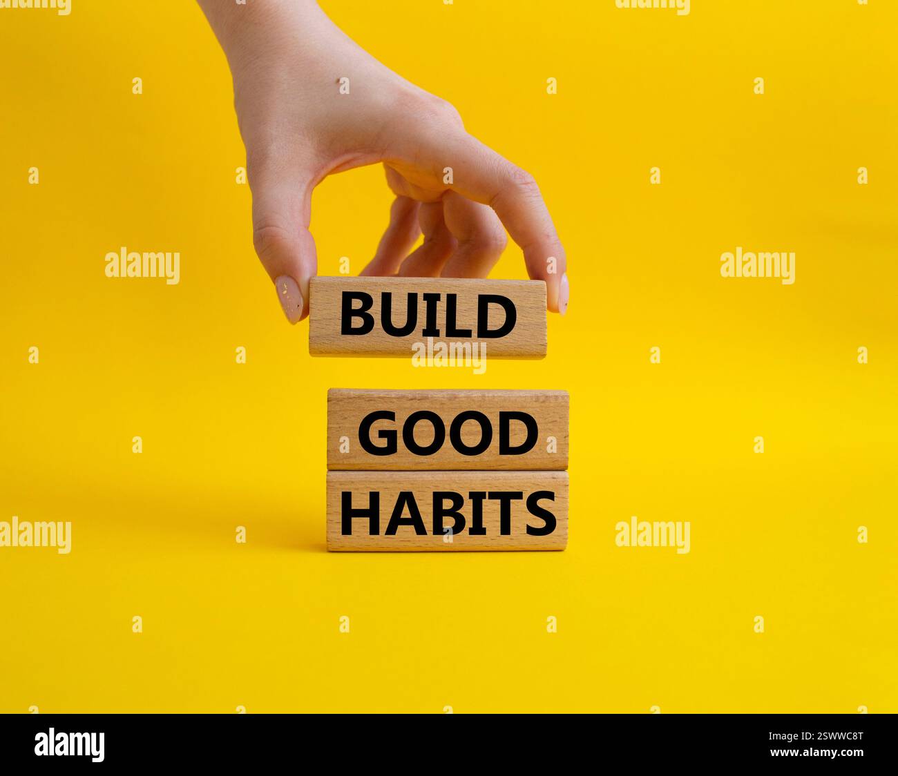 Build good habits symbol. Wooden blocks with words 'Build good habits ...