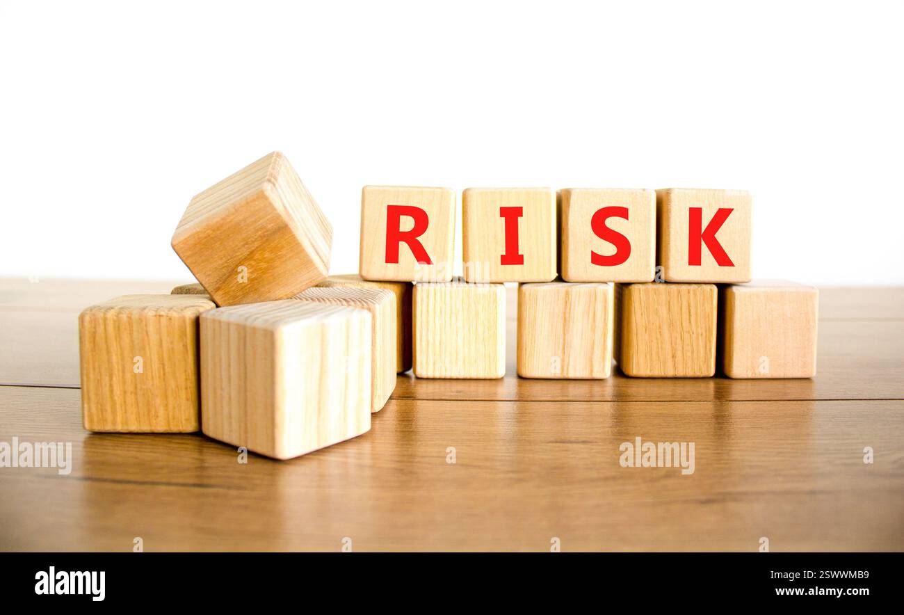 Risk symbol. Concept word Risk on beautiful wooden blocks. Beautiful ...