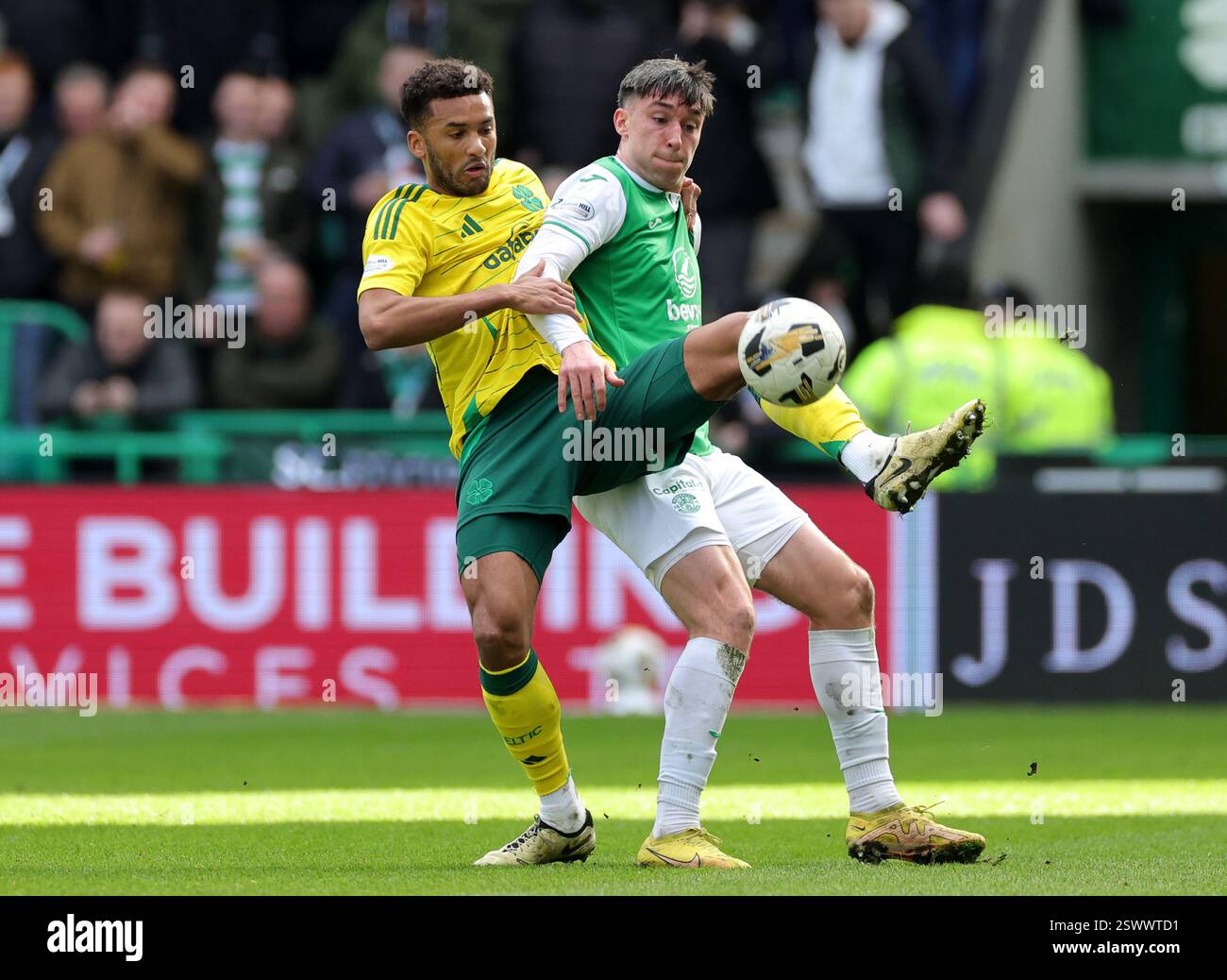 Celtic's Auston Trusty (left) and Hibernian's Kieron Bowie battle for ...