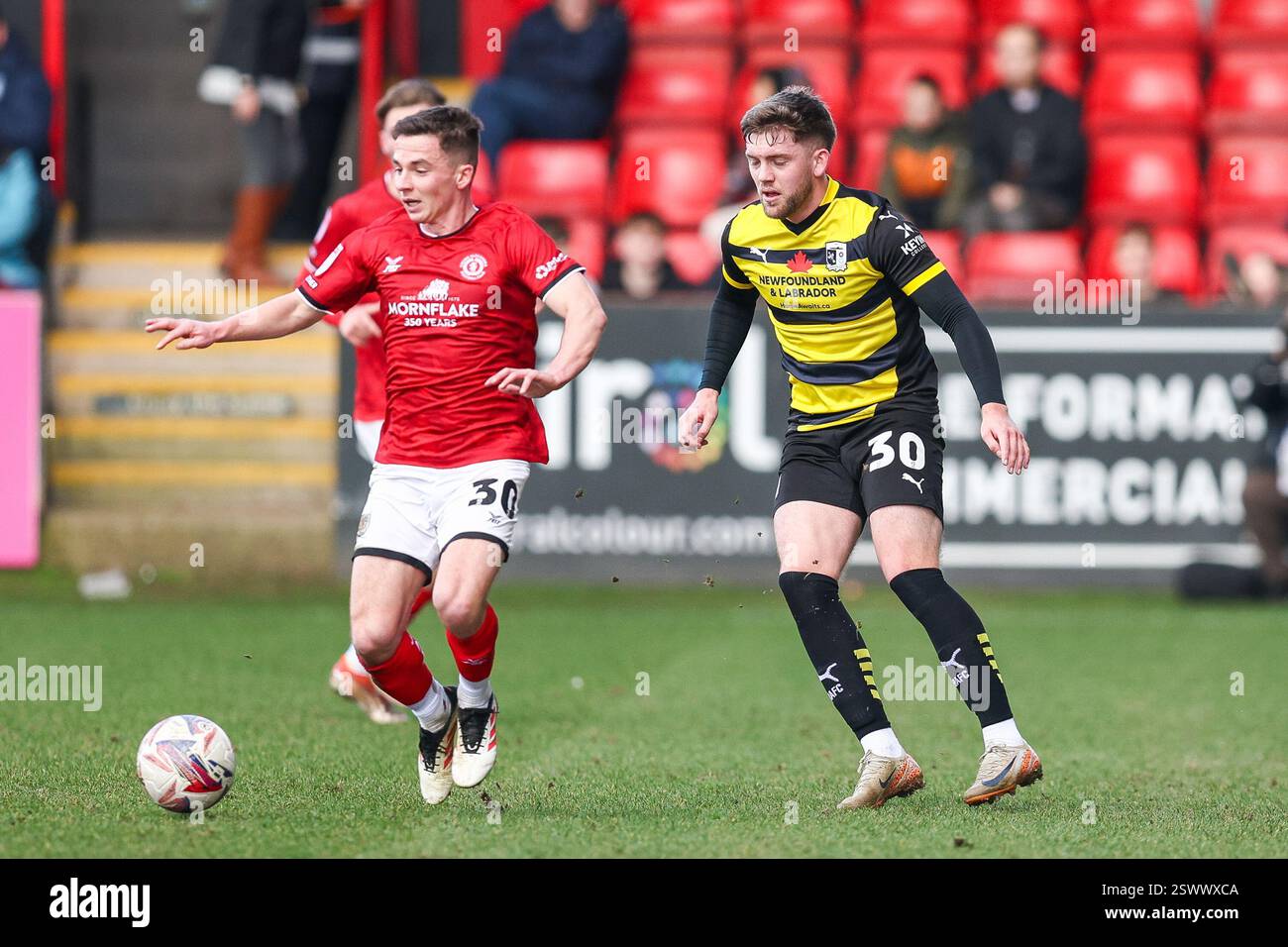 #30, Tom Lowery of Crewe Alexandra & #30, Ben Jackson of Barrow AFC in ...