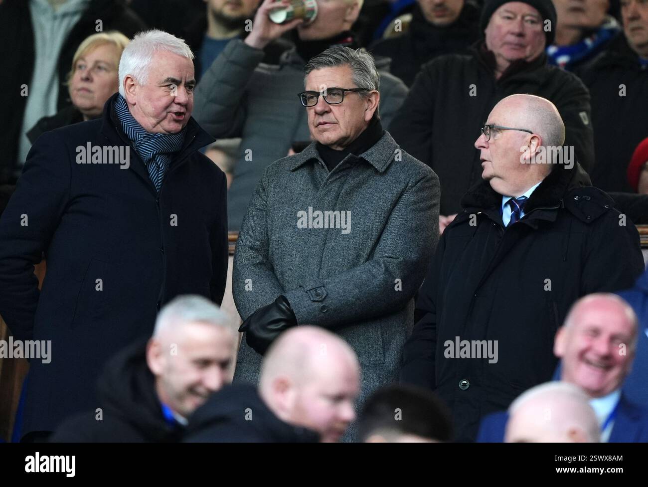 Andrew Cavenagh (centre) in the stands during the William Hill ...