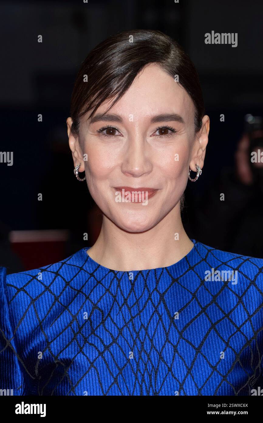 Sibel Kekilli poses for photographers upon arrival on the red carpet ...