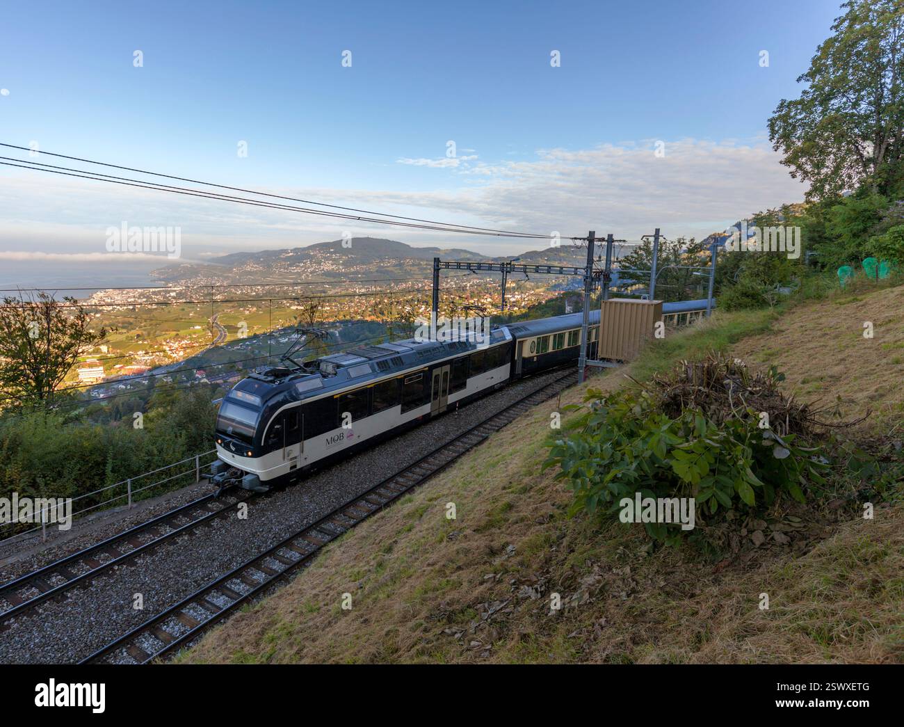 Swiss Golden pass train arriving at Chamby (Switzerland) hauled by a ...