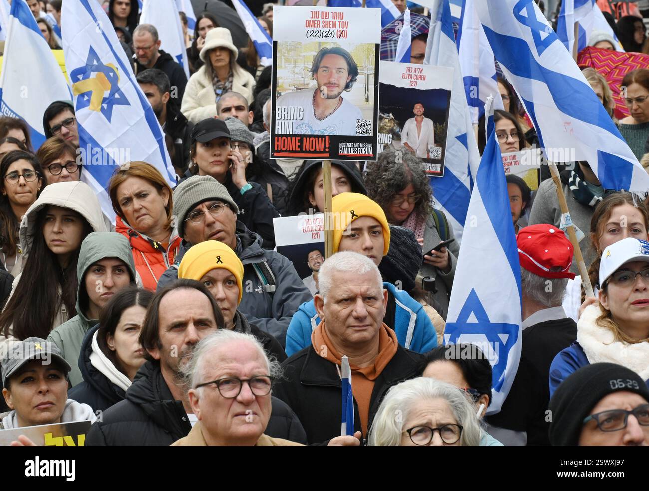 People gather in Hostage Square in Tel Aviv to watch a live broadcast ...
