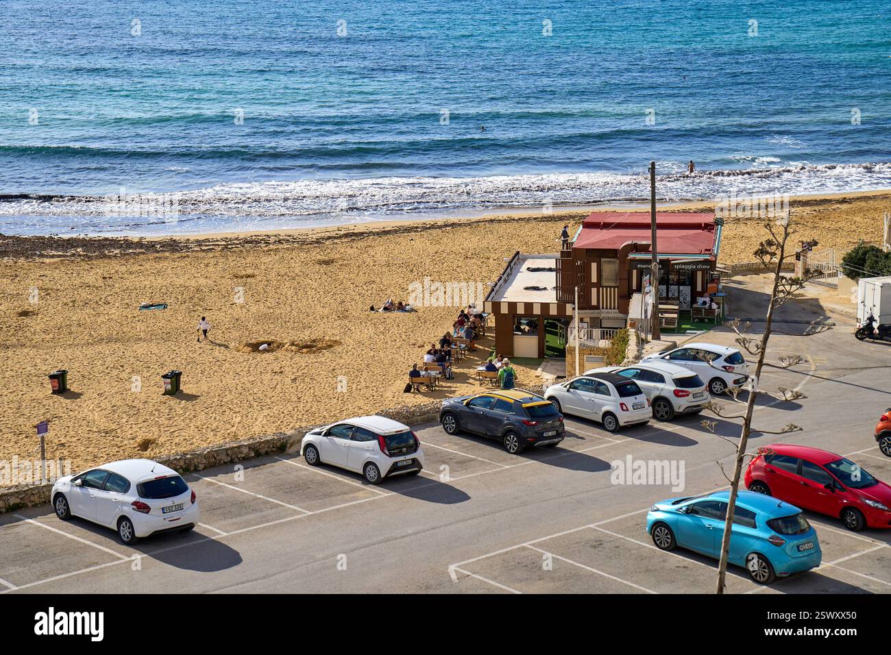 Malta - December 4, 2023: A sandy beach in Malta with a small beach ...