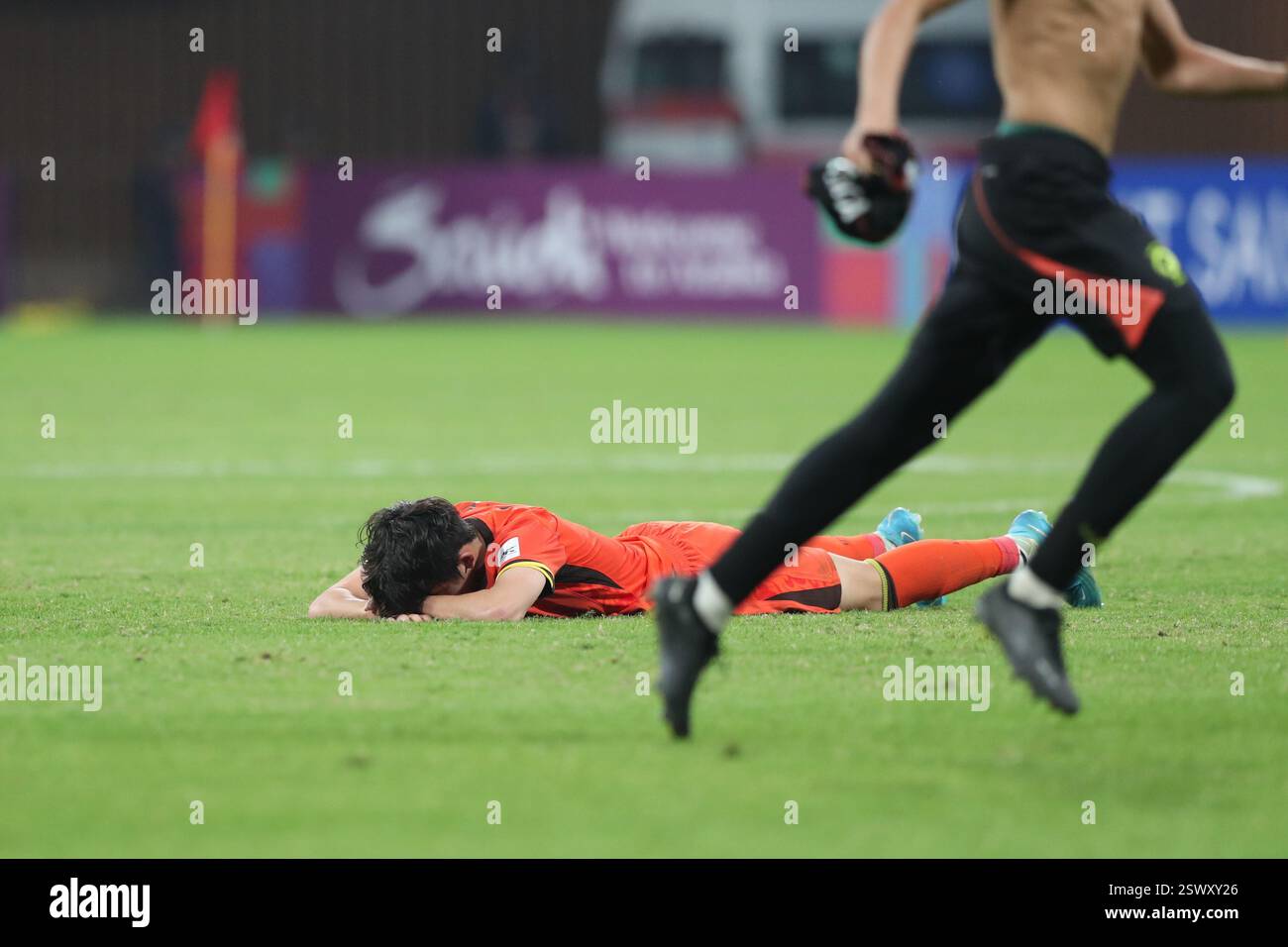 Shenzhen, China's Guangdong Province. 22nd Feb, 2025. Liu Chengyu of China reacts after the ...