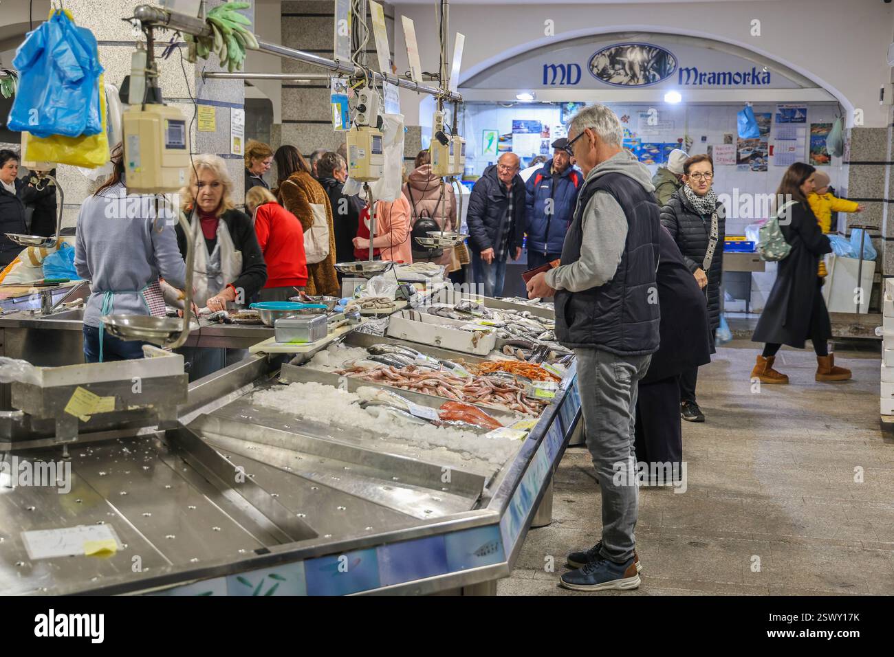 The saleswomen in the Pula fish market have their hands full after the ...