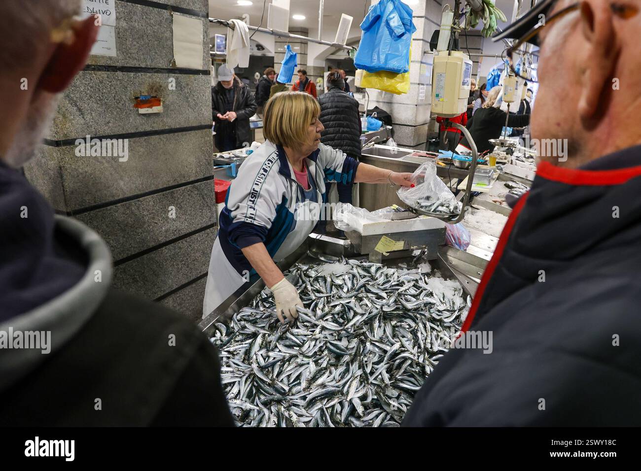 The saleswomen in the Pula fish market have their hands full after the ...