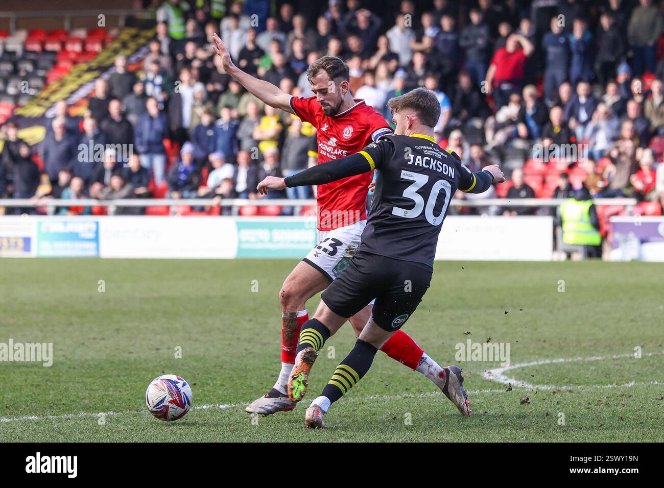 #23, Jack Powell of Crewe Alexandra & #30, Ben Jackson of Barrow AFC ...
