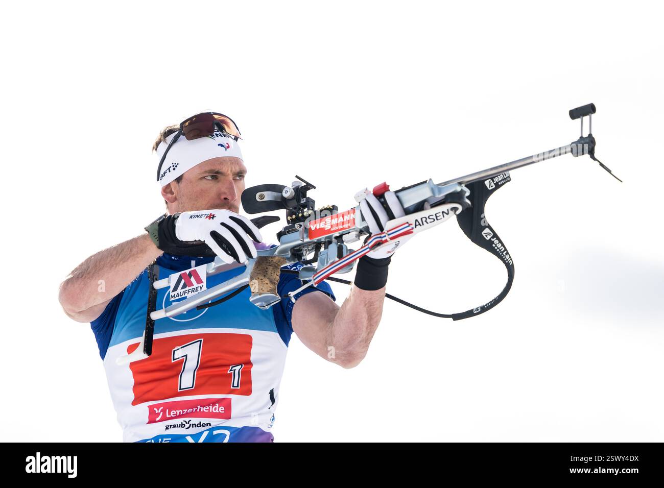 250222 Emilien Claude of France during zeroing ahead of men's 4 x 7,5 ...