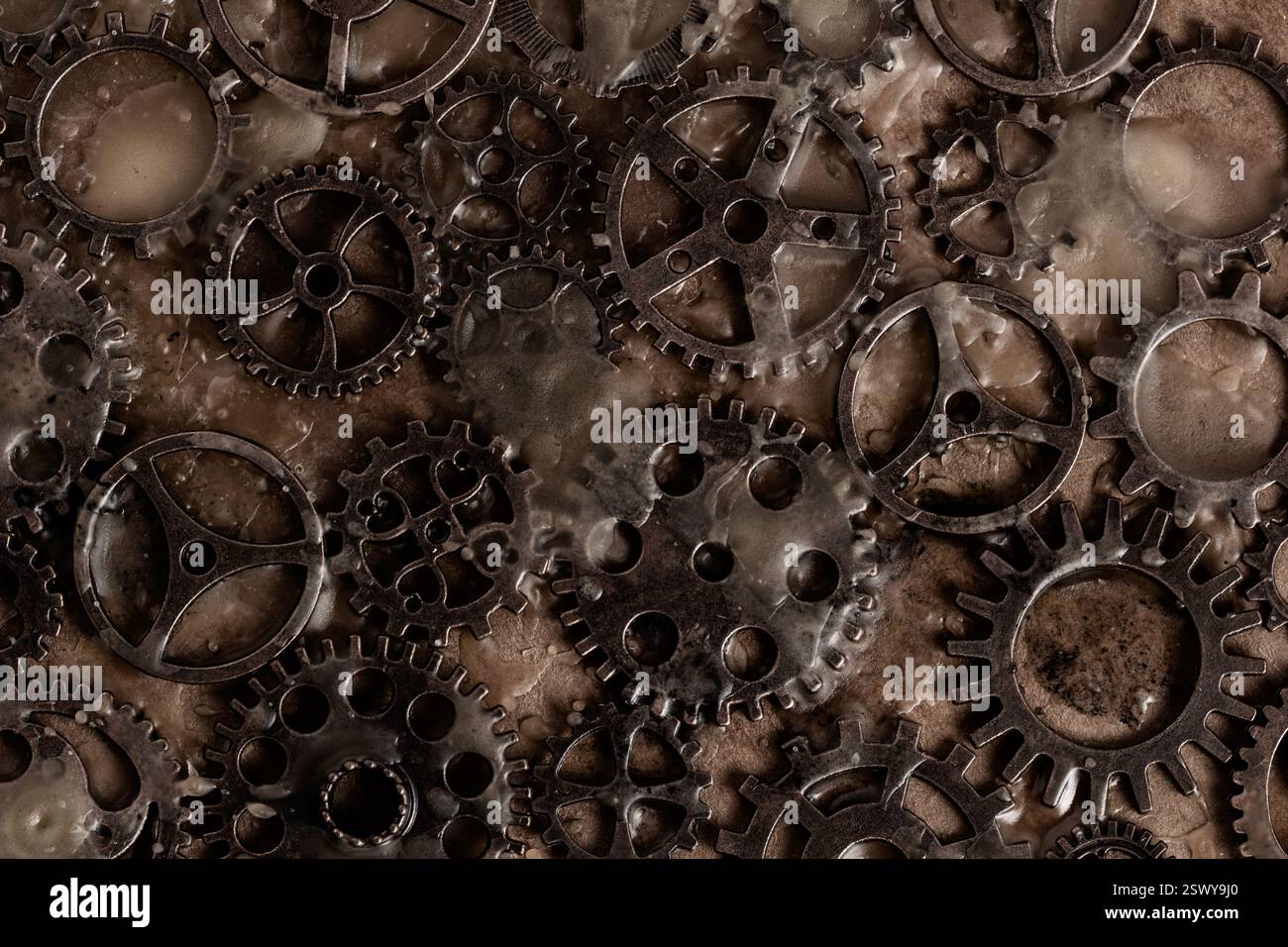 Rusty gears on grunge background create conceptual steampunk aesthetic ...