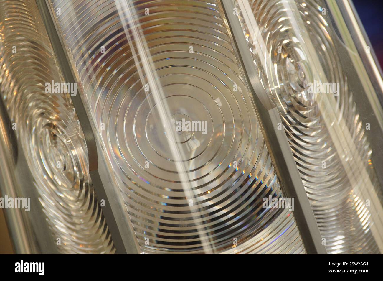 Close-up of glass lens patterns creating mesmerizing optical illusions ...