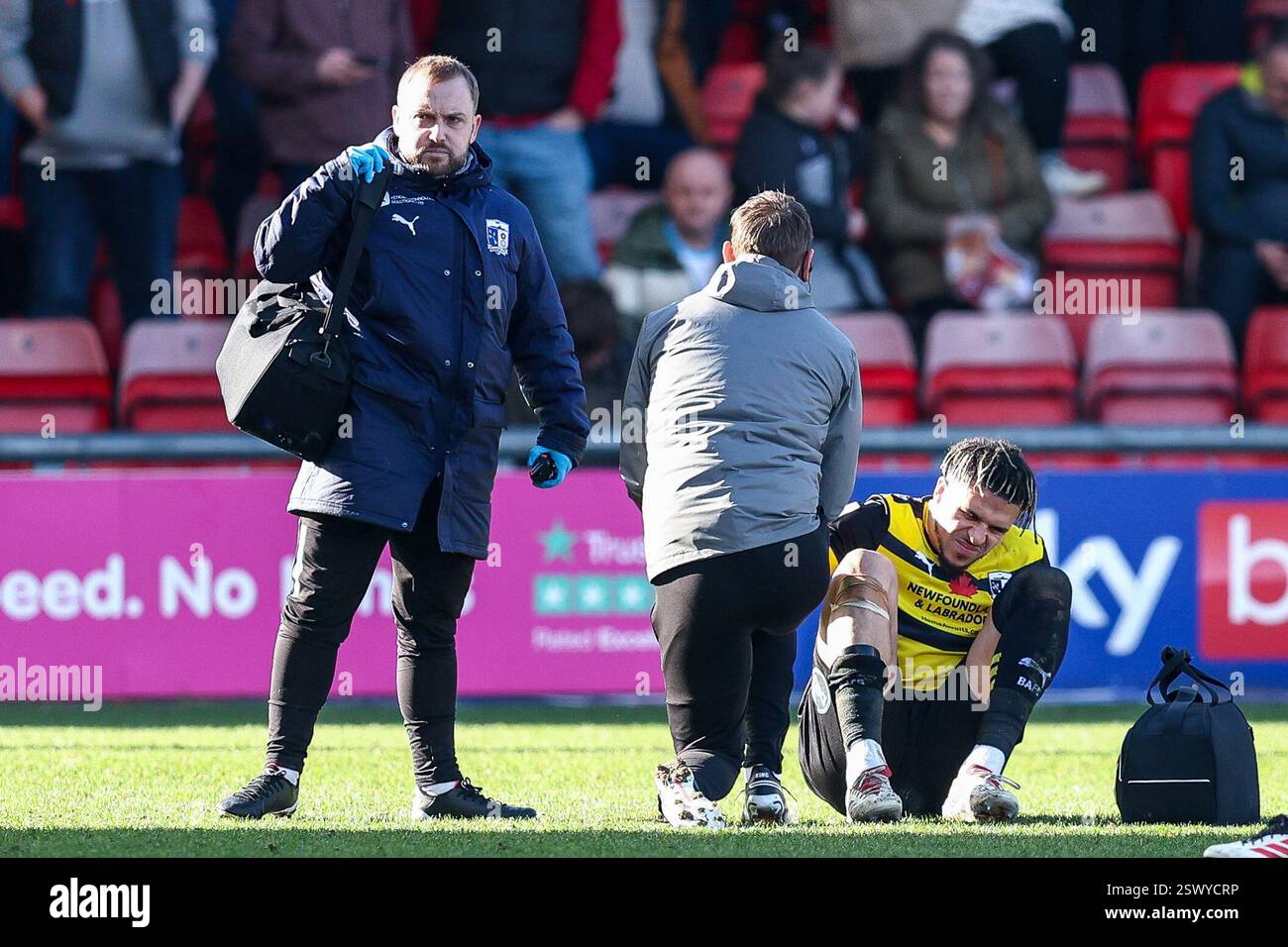 #42, Theo Vassell of Barrow AFC is assisted to his feet during the Sky ...