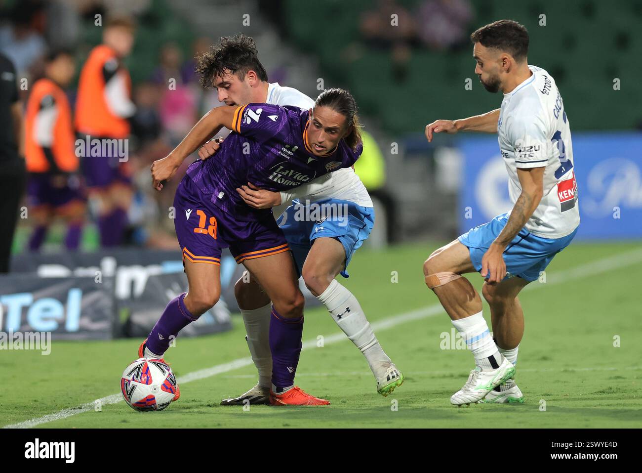 Lachlan Wales of the Glory is tackled by Zac De Jesus of Sydney FC ...
