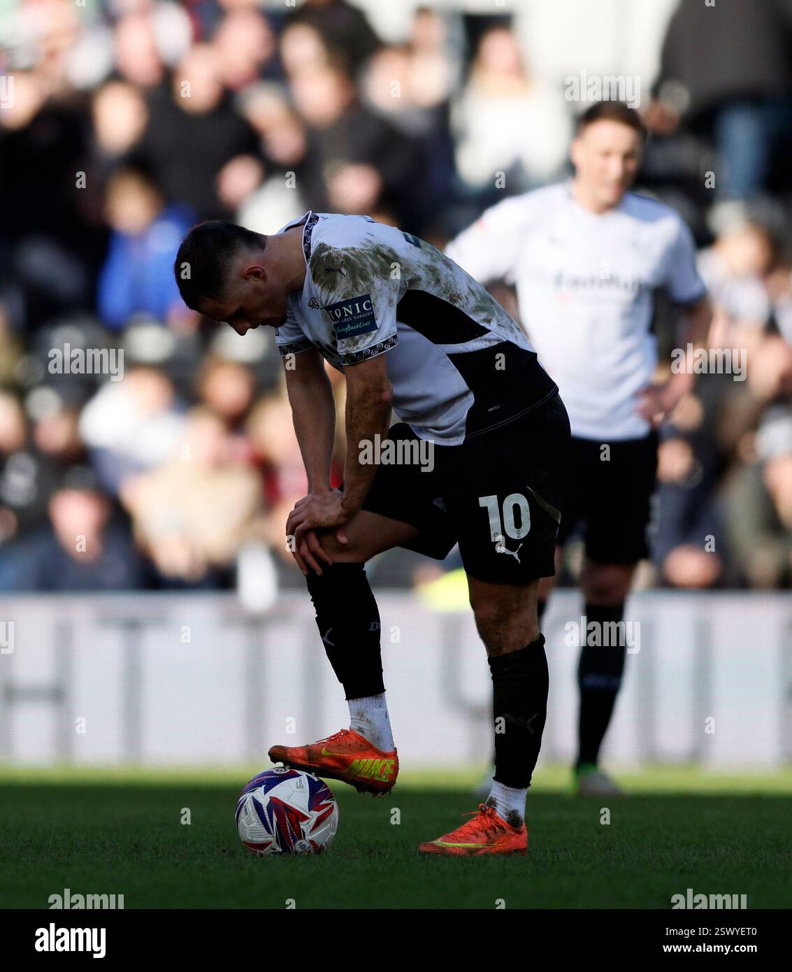 Derby County's Jerry Yates stands dejected after his side concede late ...