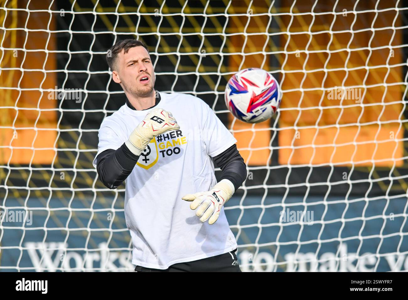 Goalkeeper Jack Stevens (1 Cambridge united) warms up during the Sky ...