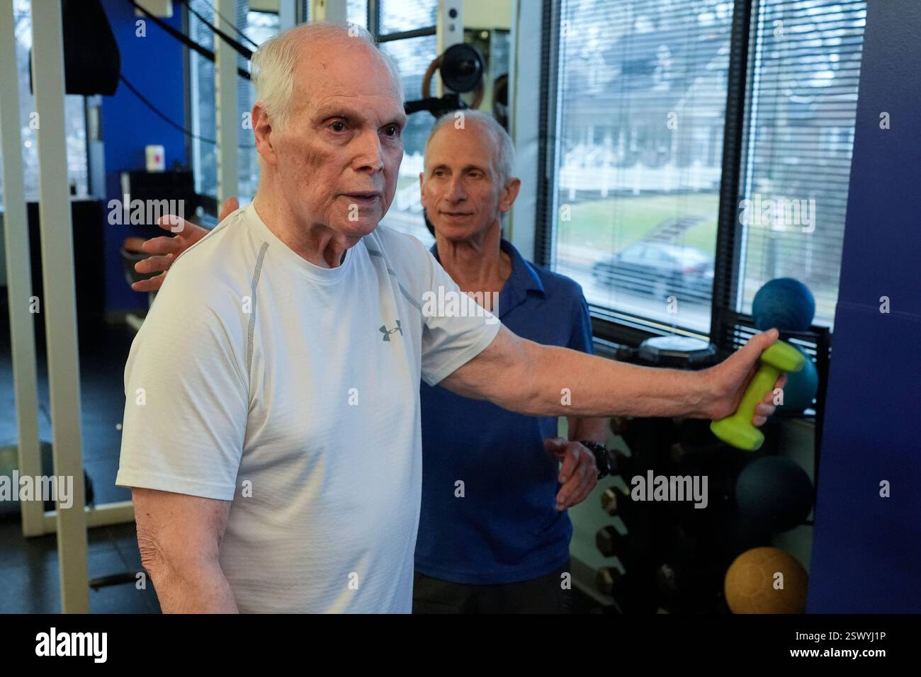 Dr. Grover Smith, left, works out with exercise scientist Dr. Irv ...