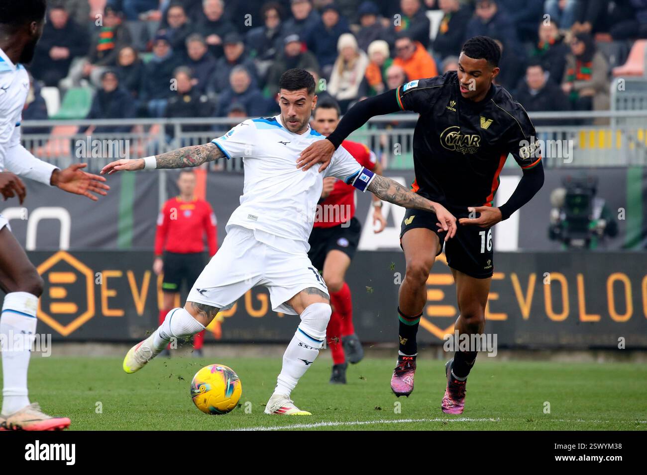 Lazio's Mattia Zaccagni, left, and Venezia's Alessandro Marcandalli in ...