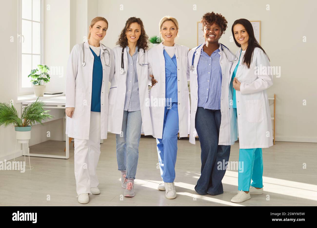 Happy female doctor group, medical students, clinic diverse team in ...