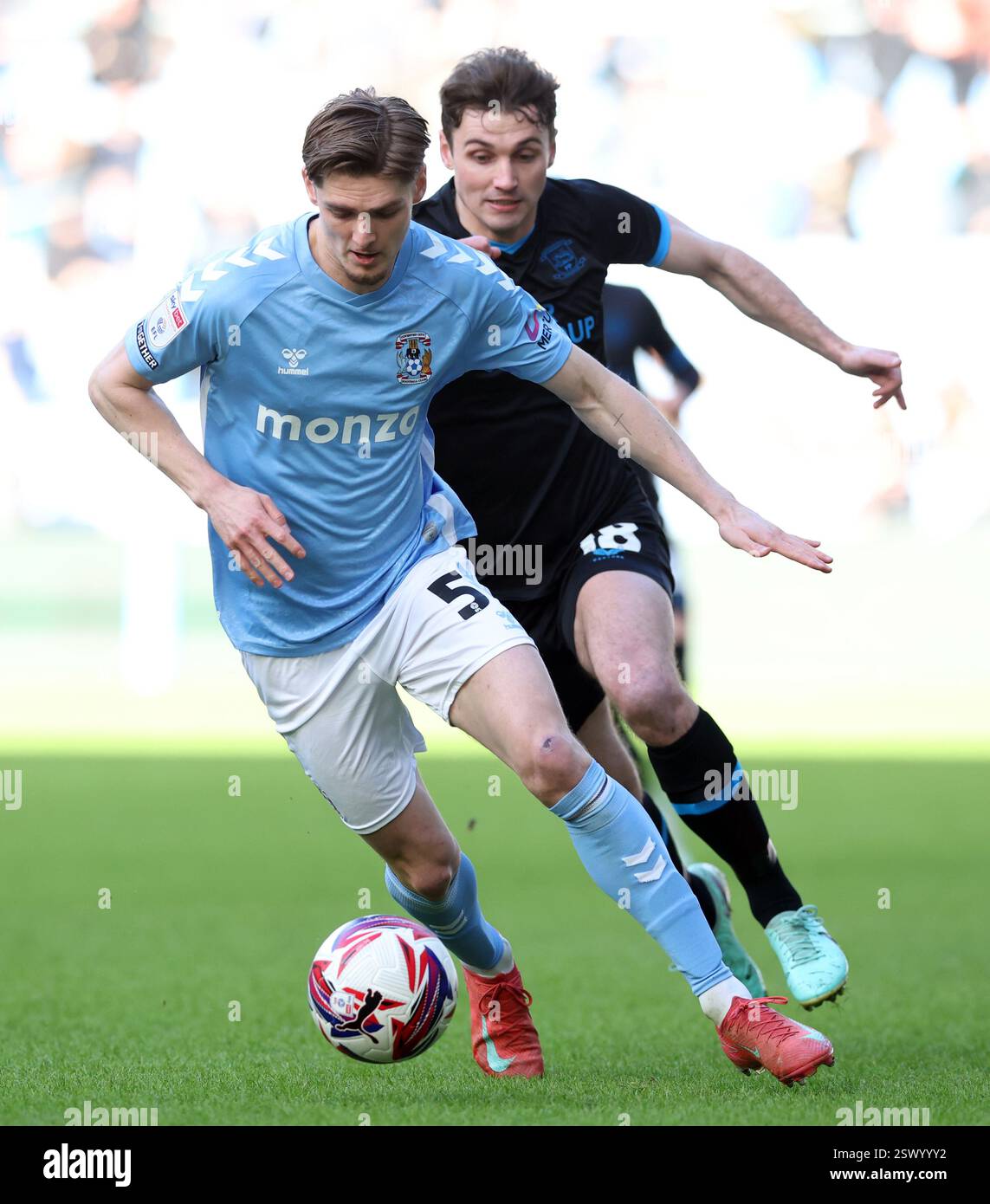 Coventry City's Jack Rudoni (left) and Preston North End's Ryan Ledson ...
