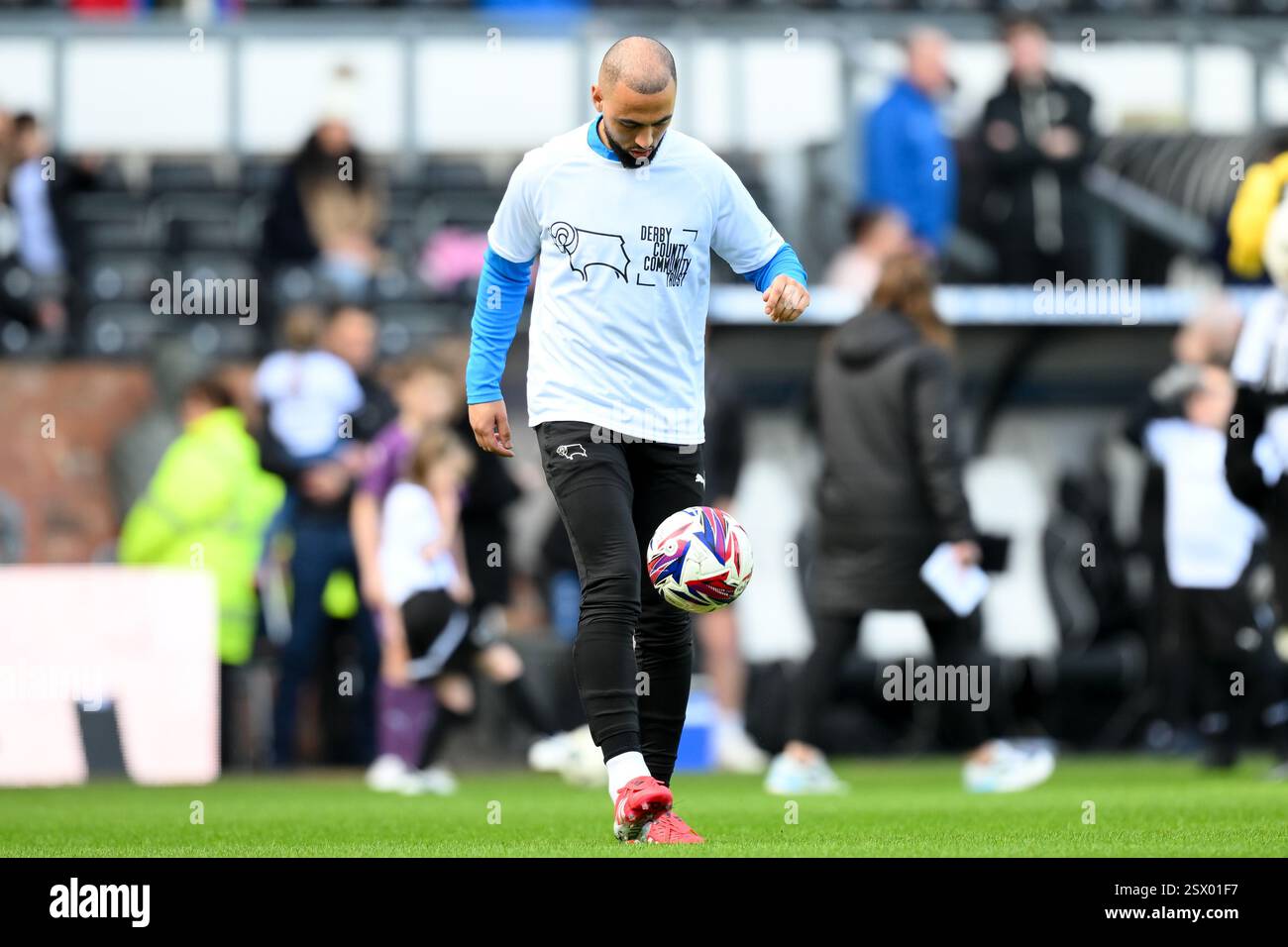 Kemar Roofe of Derby County warms up ahead of kick-off during the Sky ...