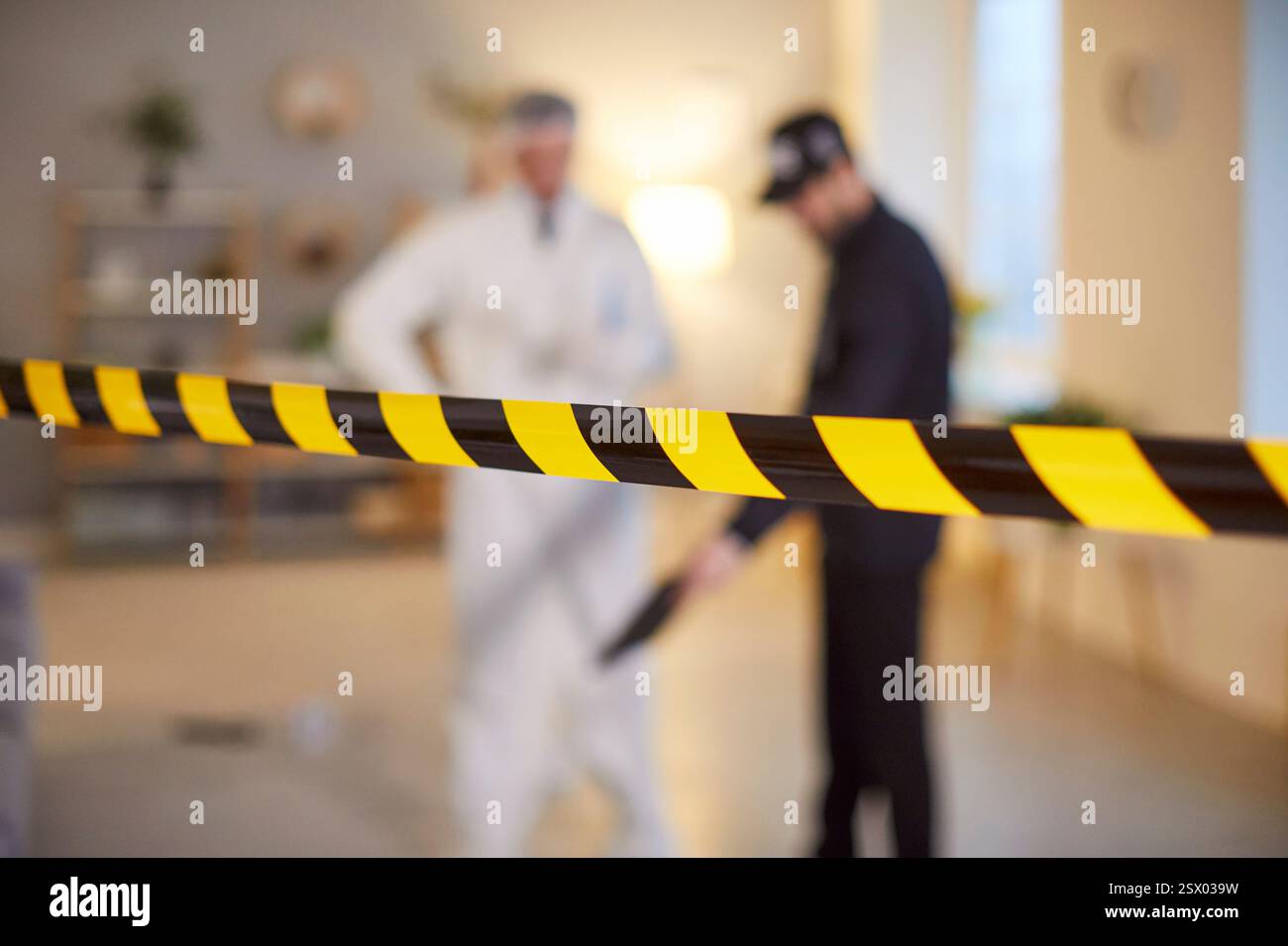 Police Tape Securing Crime Scene At Home With Investigator Working ...