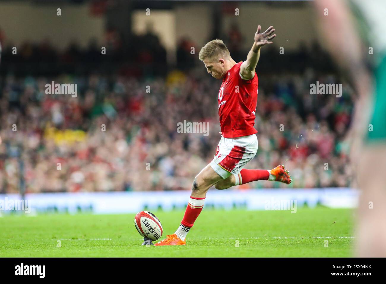Cardiff, UK. 22nd Feb, 2025. Gareth Anscombe of Wales kicks a penalty ...