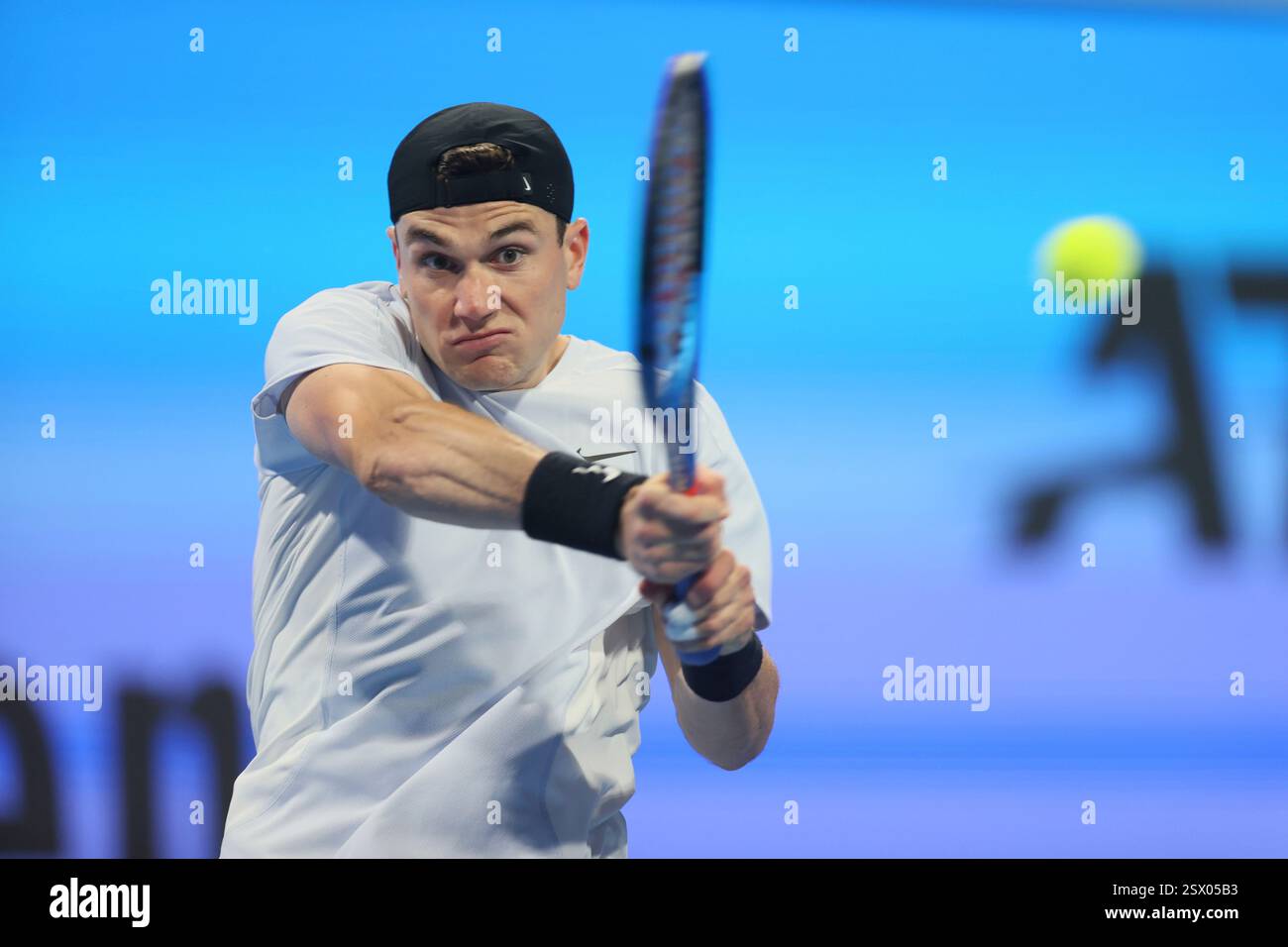 Britain's Jack Draper plays a shot against Russia's Andrey Rublev ...