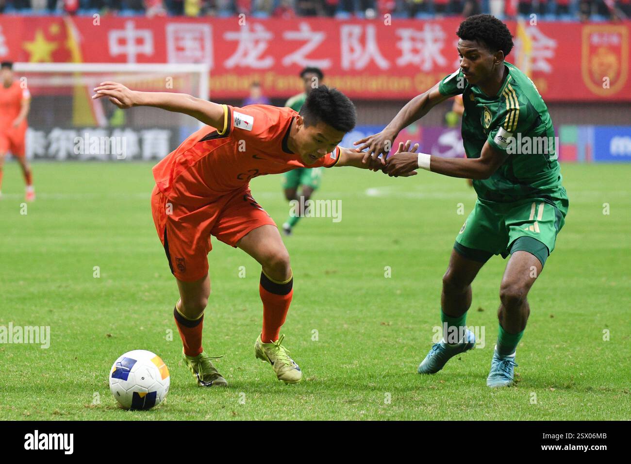 Shenzhen, China. 22 February, 2025. Alex Yang #23 of China during the 2025 AFC U20 Asian Cup ...
