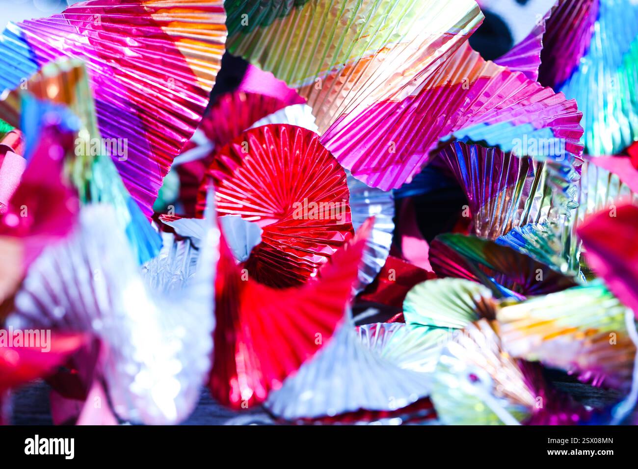colorful garlands as background, party Stock Photo - Alamy