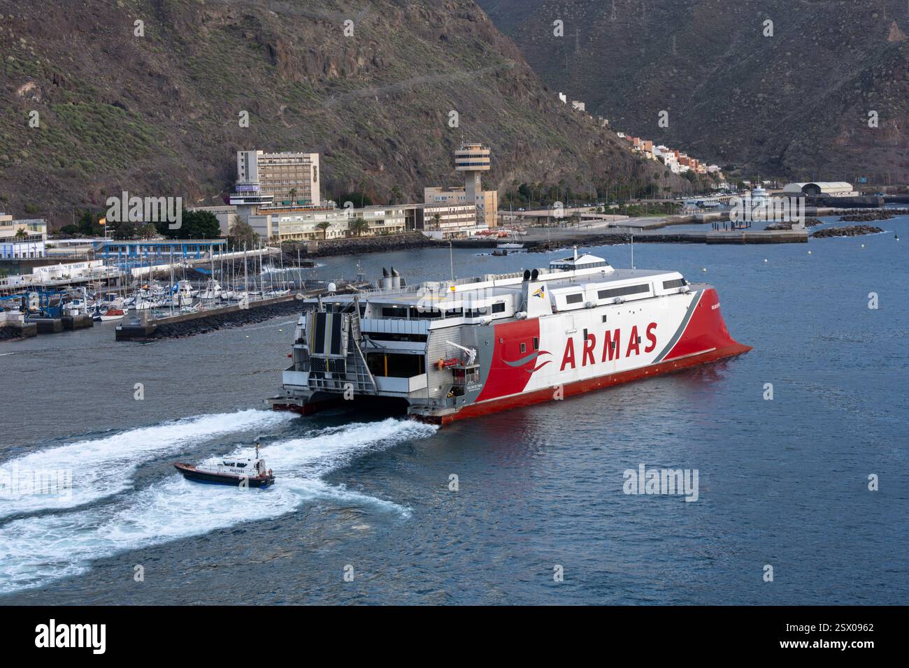 Port Santa Cruz de Tenerife, Spain, Armas ferry with tug boat Stock ...