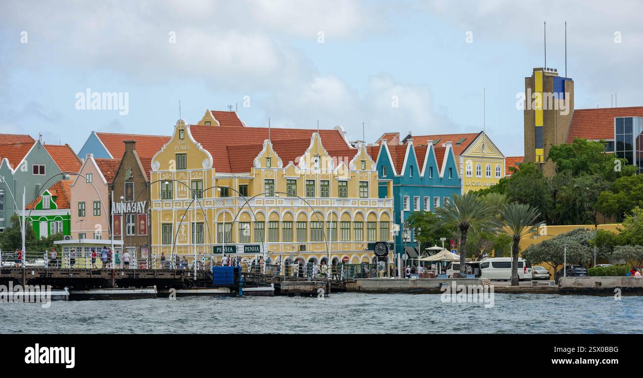 The Queen Emma Bridge is a floating pontoon bridge that connects the ...