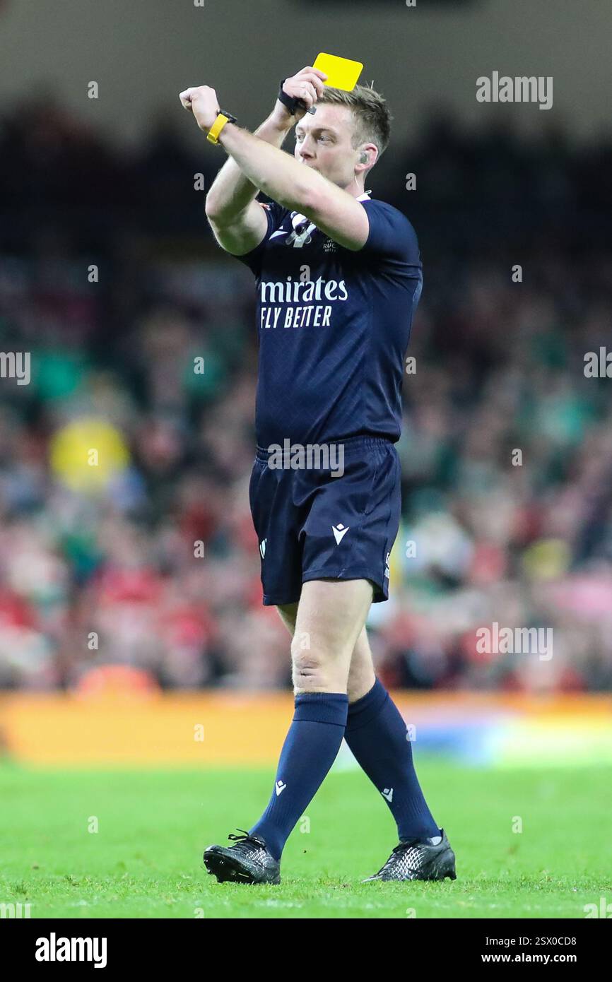 Referee Christophe Ridley shows a yellow card to Garry Ringrose of ...