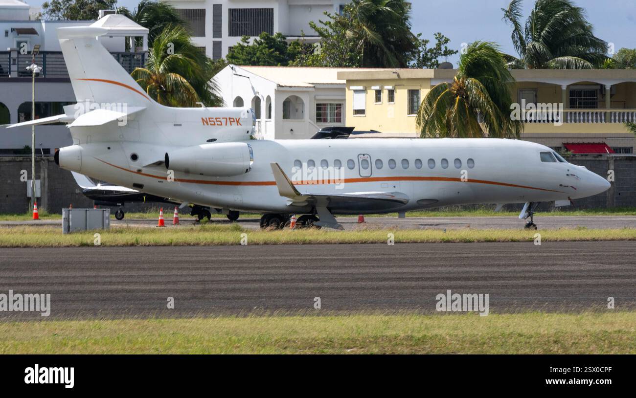 a 2010 Dassault Falcon 7X, a fixed-wing multi-engine jet with three ...
