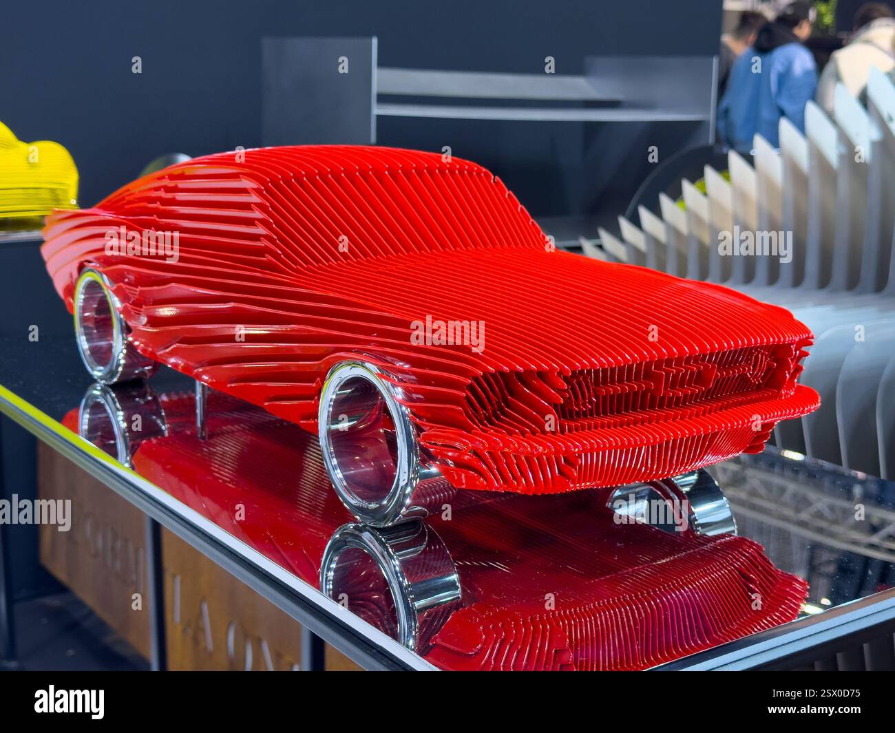 Creative display of a vibrant car sculpture at an innovative design ...